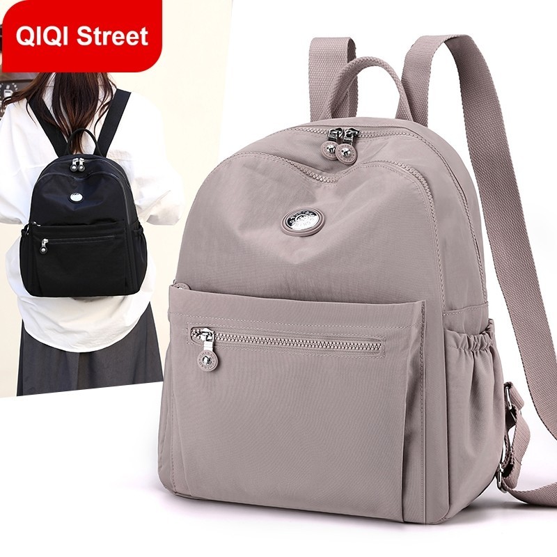Korean version multi compartment backpack. fashionable and minimalist ...