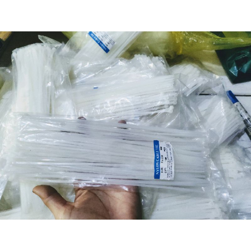 Package of 100 black and white plastic drawstrings of all sizes and ...