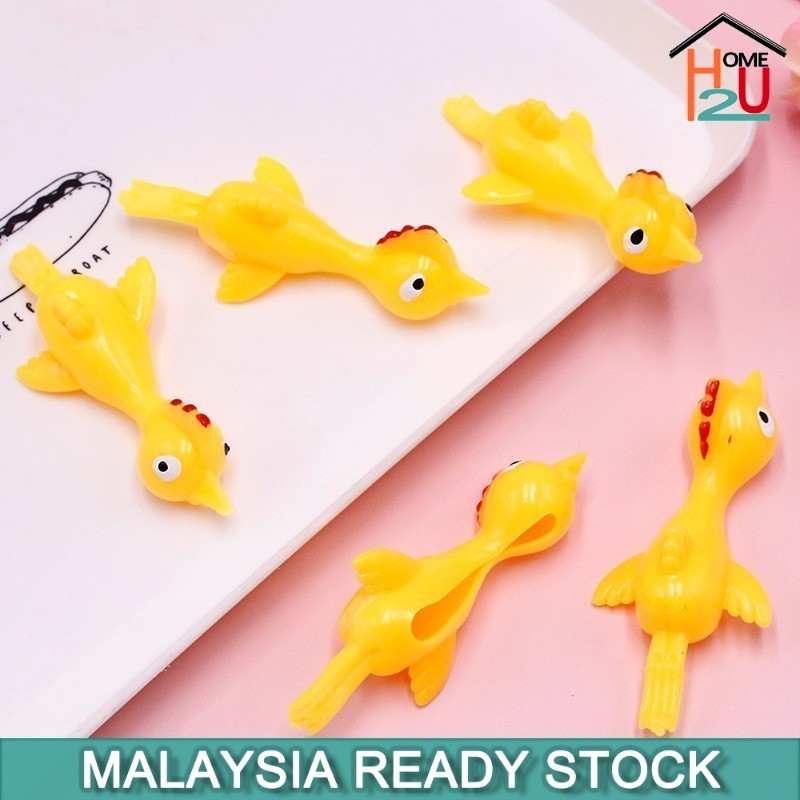 Fun finger darts with a bouncing rubber chicken that bounces little ...
