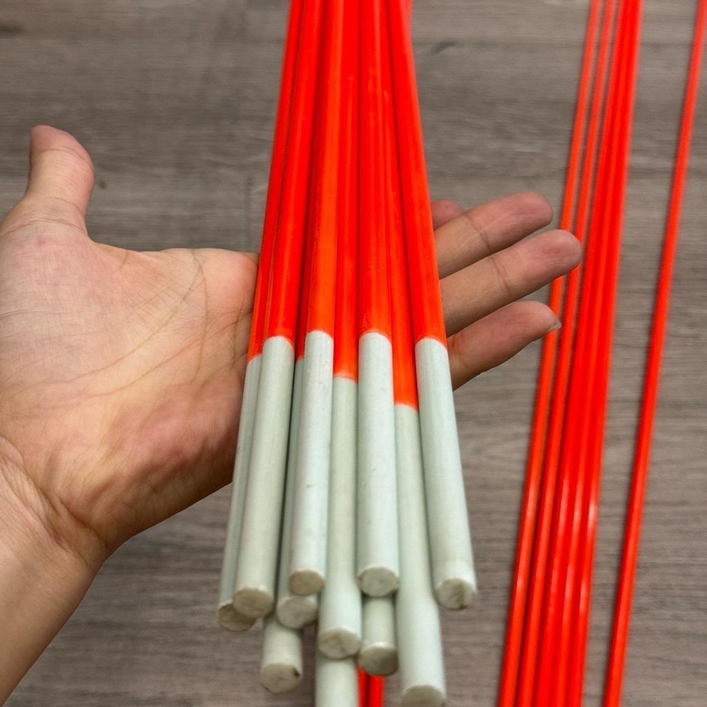 Flexible orange glass slats, used to make flute poles, tails, fishing ...