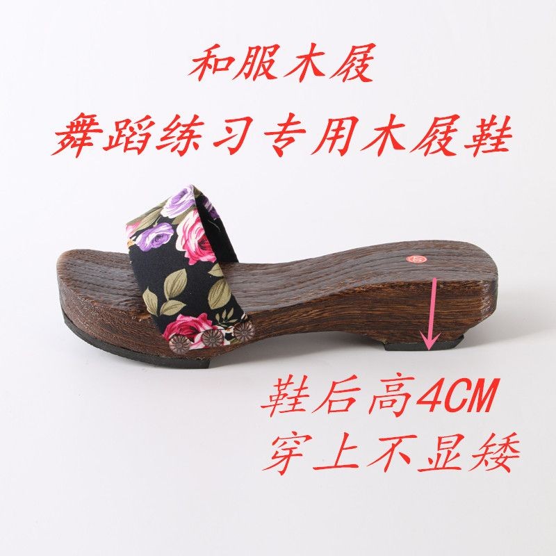 Women with Chinese style wooden clogs, women with paulownia sandals ...