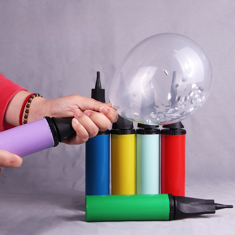 Inflator balloon swimming circle inflating inflating pump hand pushing ...