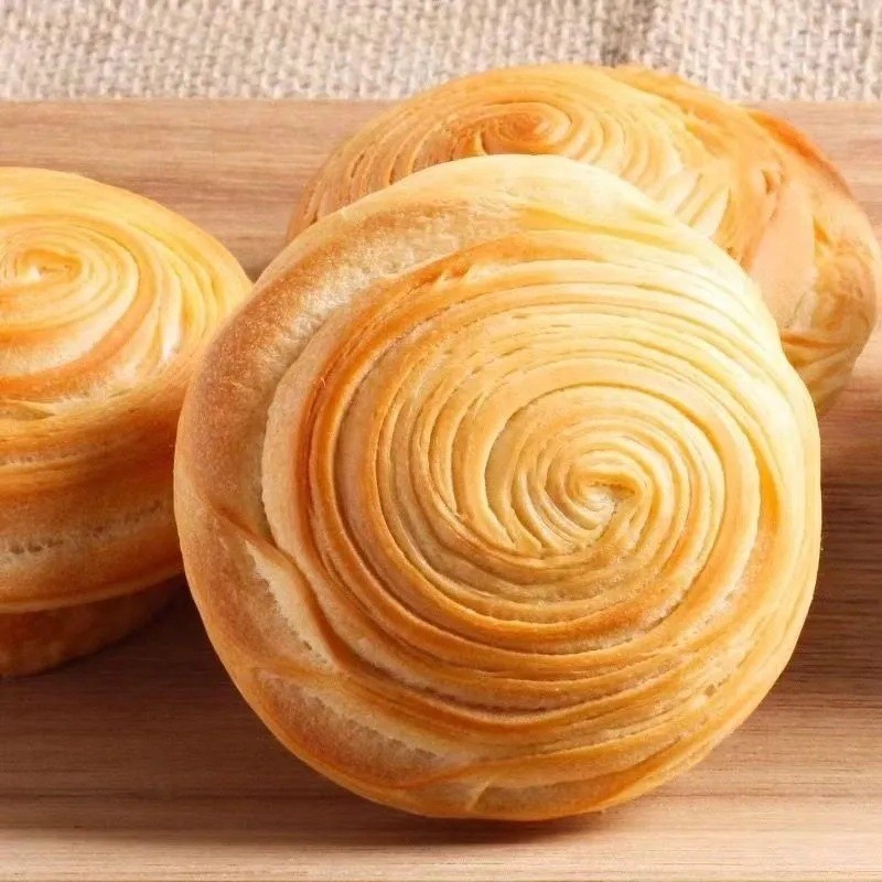 Individually packaged hand-torn bread with a strong milky flavor ...