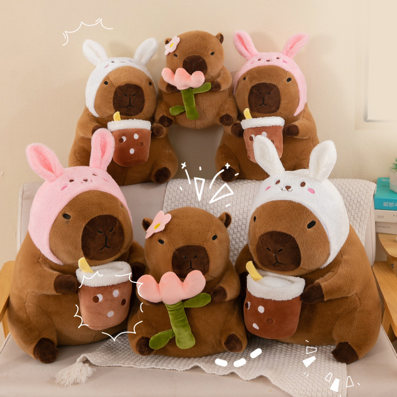 Cute milk tea hug flower capybara capybara plush toy | Shopee Malaysia