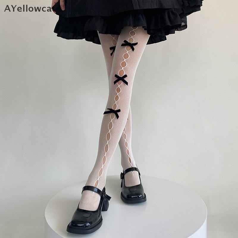AY Three Bow Holes In Black And White With Bow Jumpsuit Fishnet ...
