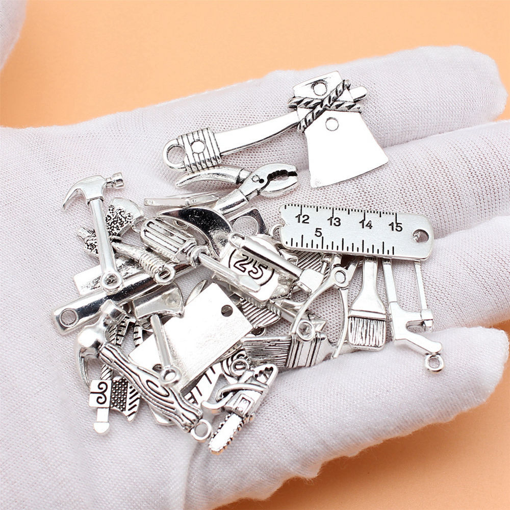 25pcs/lot Antique Silver Color Tools Chainsaw Ax Hammer Screwdriver ...