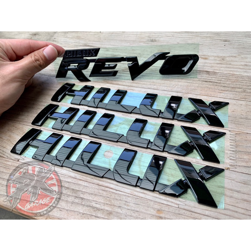 Toyota Hilux Logo Revo Glossy Black Plate New Genuine Spare Parts ...