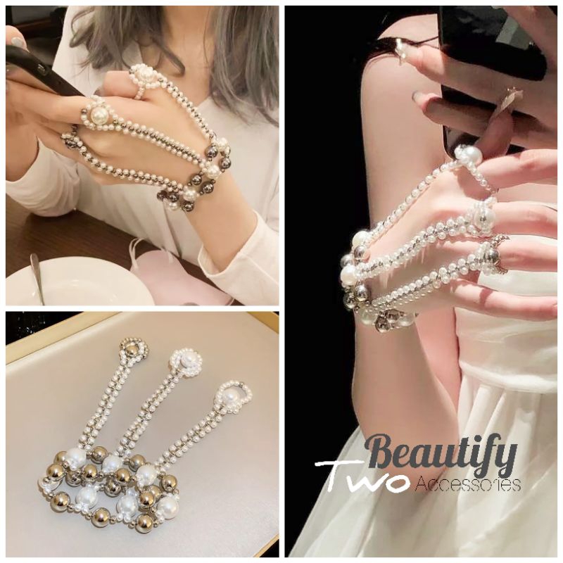 A Ring Bracelet Set With Imitation Pearls And Metal. Luxury And Chic ...