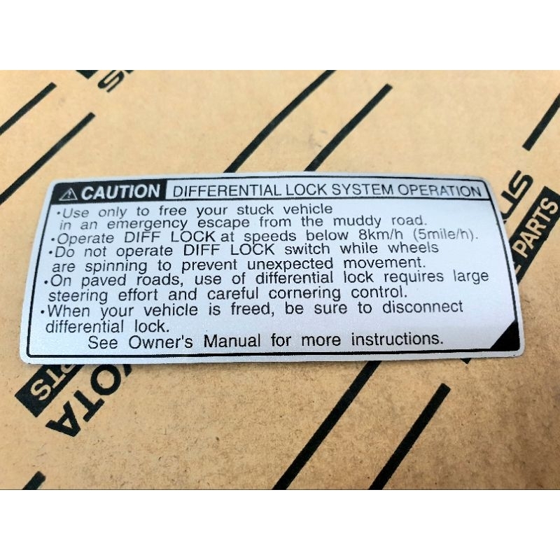 Sticker/Sticker CAUTION DIFFERENTIAL LOCK SYSTEM OPERATION Genuine Part ...