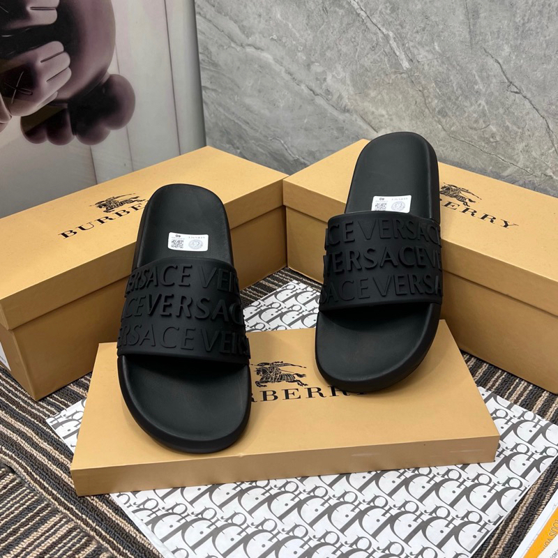 Men's slippers with cross straps VS rubber straps embossed with ...