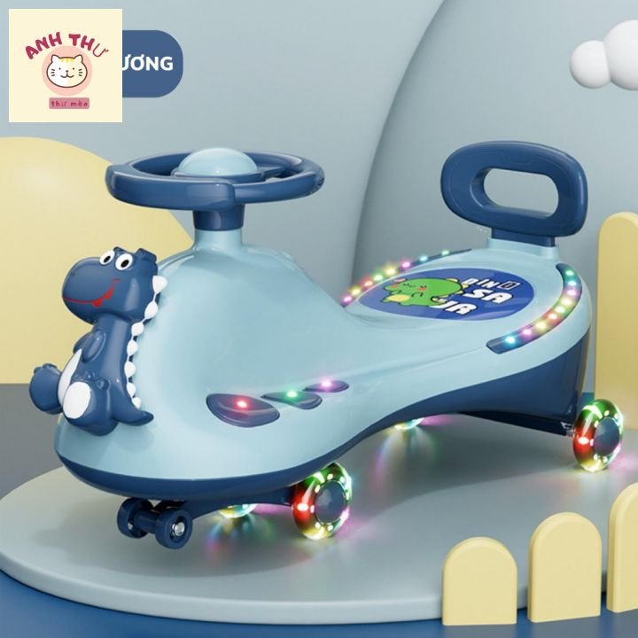 Dinosaur swing and footrest with musical footrest and flashing lights ...