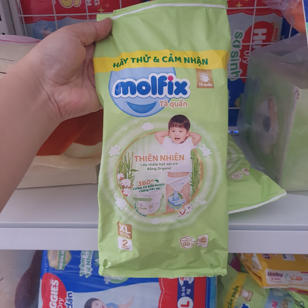 Combo of 14 pieces of Molfix diapers (7 packs of 2 pieces) (Packaging ...