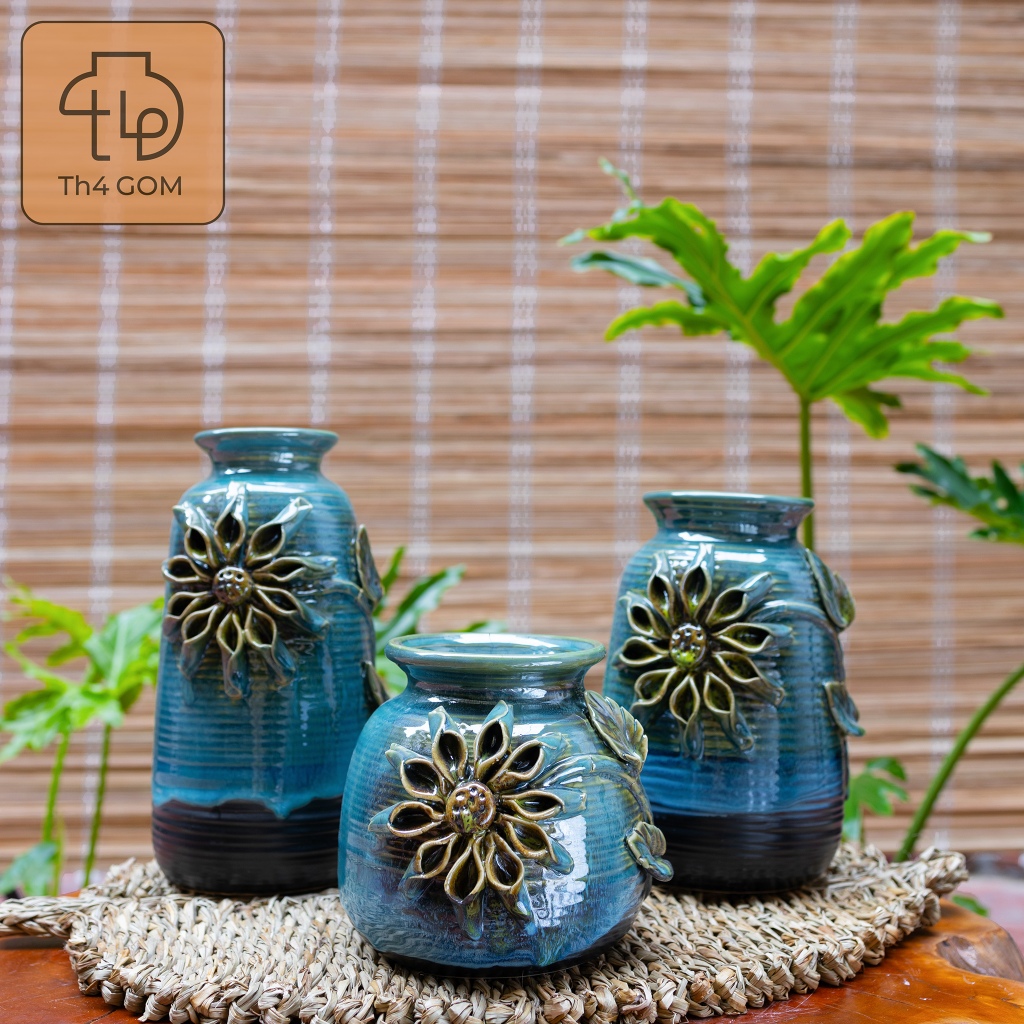 Collection of Bat Trang flower vases with green enamel embossed flowers ...