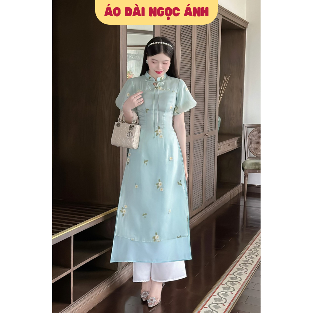 Innovative female Ao Dai Ngoc Anh blue color design bow tie with pearl ...