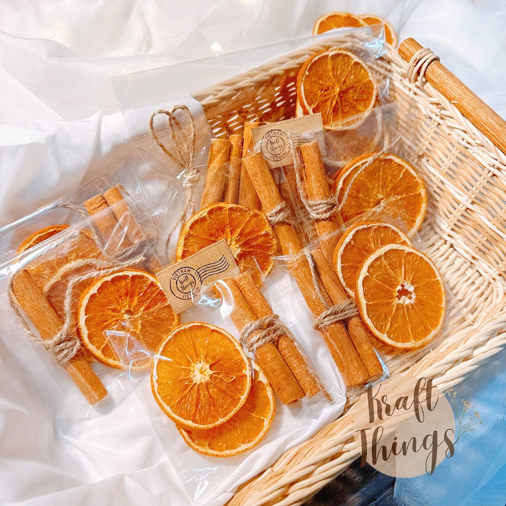 Set of dried orange and cinnamon with rope to decorate Christmas gift ...