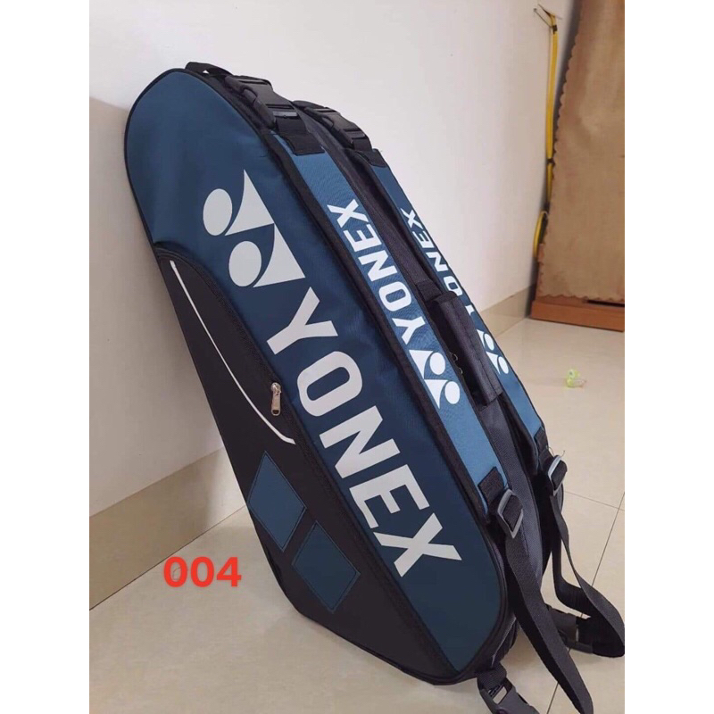 Badminton and tennis racket bag with 2 main compartments, 1 side ...
