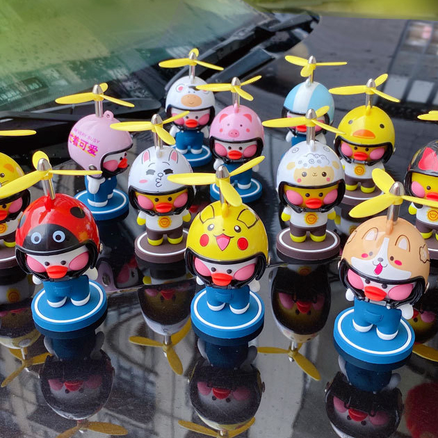 Douyin duck wearing a cute helmet with spinning pinwheel mounted on ...