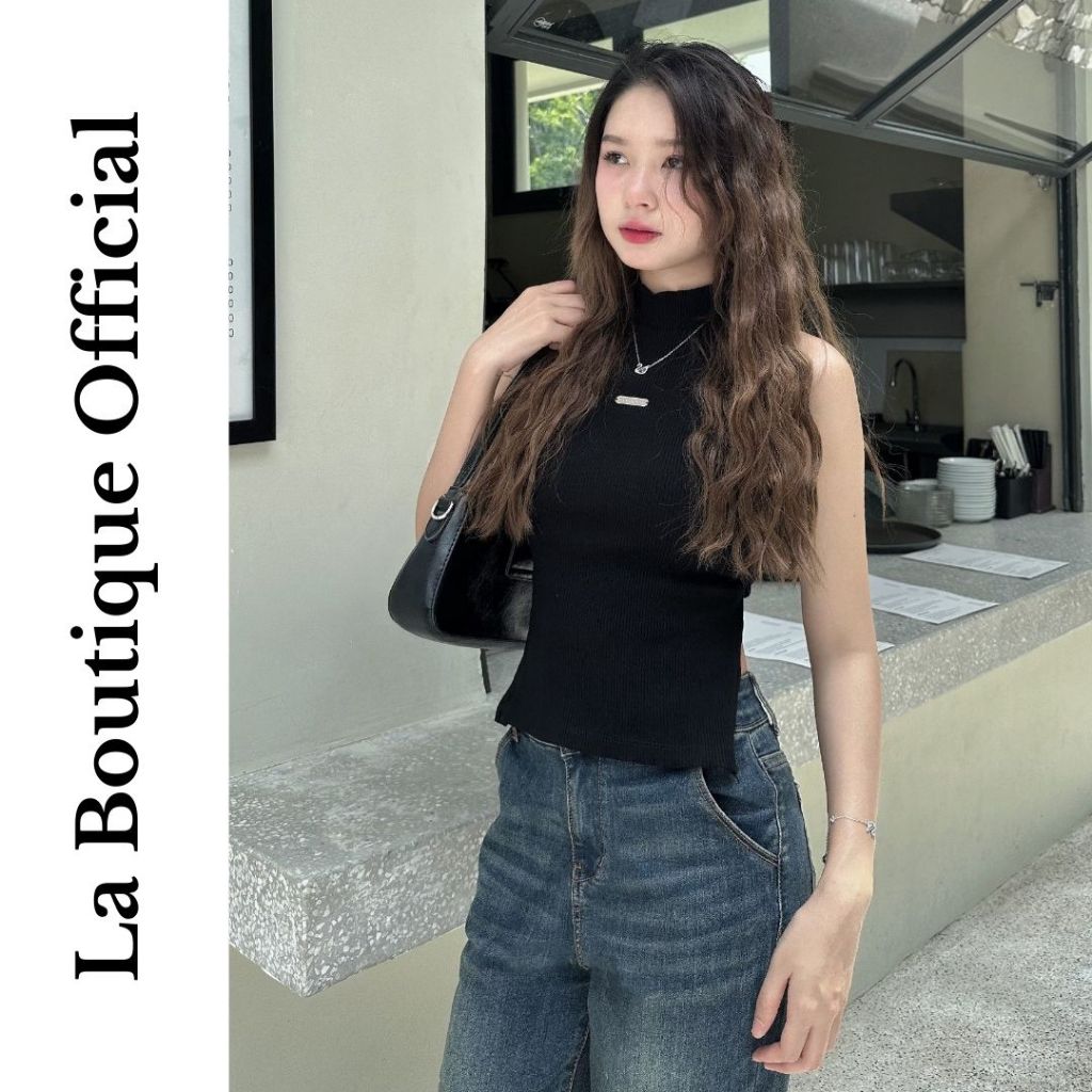 La Boutique backless turtleneck crop top hugs the body and flatters the ...