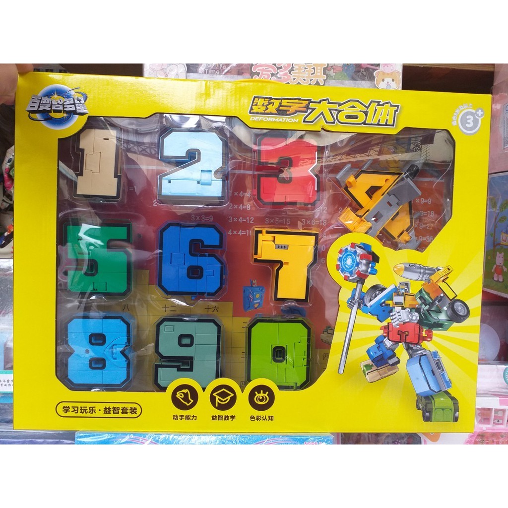 Toy set of letters, robot transforming numbers, and tanks for children ...