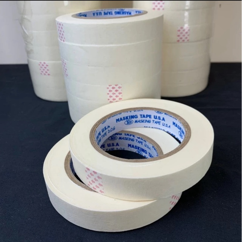 Large roll of paper tape to fix picture edges for writing names and ...