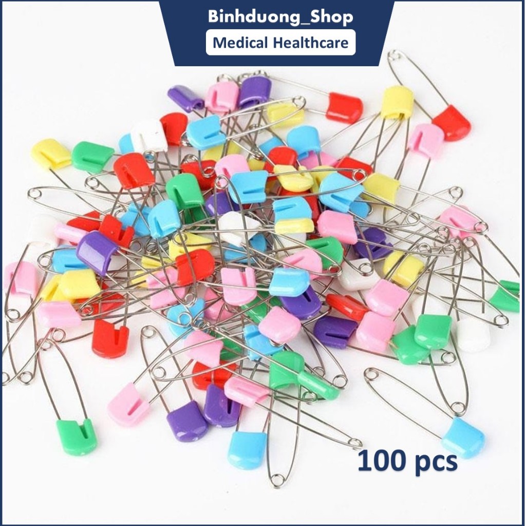 Set of 100 safety pins with plastic heads of various sizes used in ...