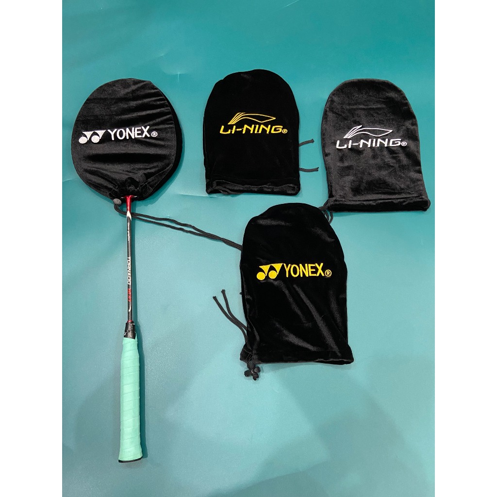 Velvet bag protects badminton racket surface against scratches ...