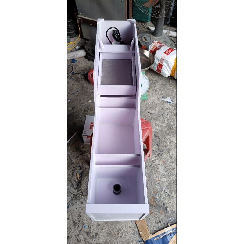 Overflow filter with hidden pump, full filter material + pump, made of ...