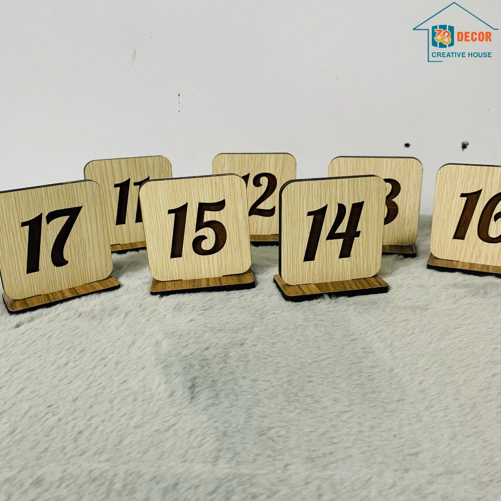 Wooden tabletop number plate designed with a stand and a 2 layers of ...