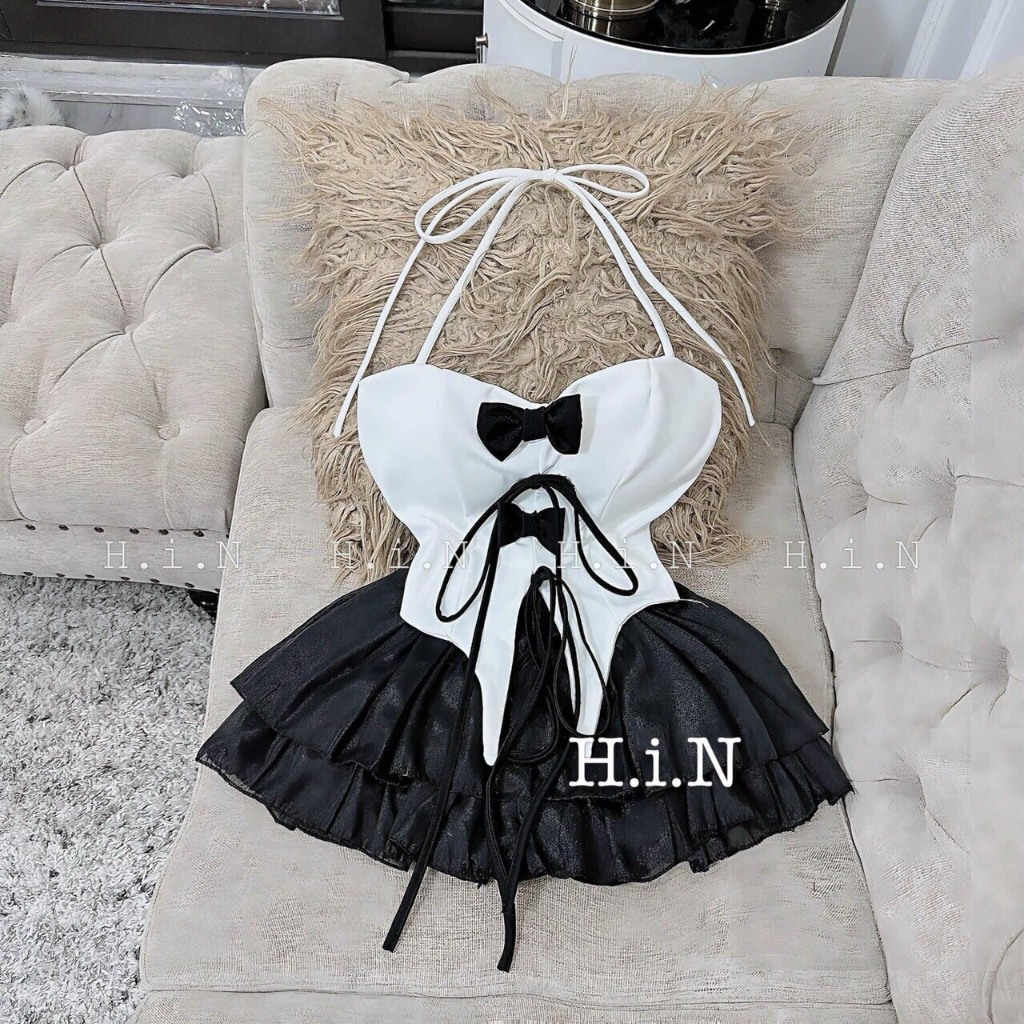 Set of bustier top with bow and halter neckline with slit in the front ...
