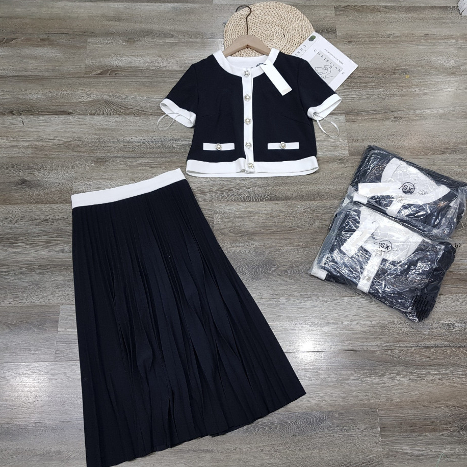Women's set of pearl button crop top and pleated CK skirt, genuine ...
