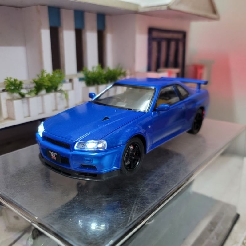 Nissan Skyline GT-R R34 1:24 Scale alloy car model with horn, lights ...
