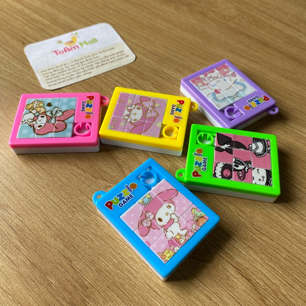 Legendary mini toy sliding puzzle, used as a keychain (random picture ...