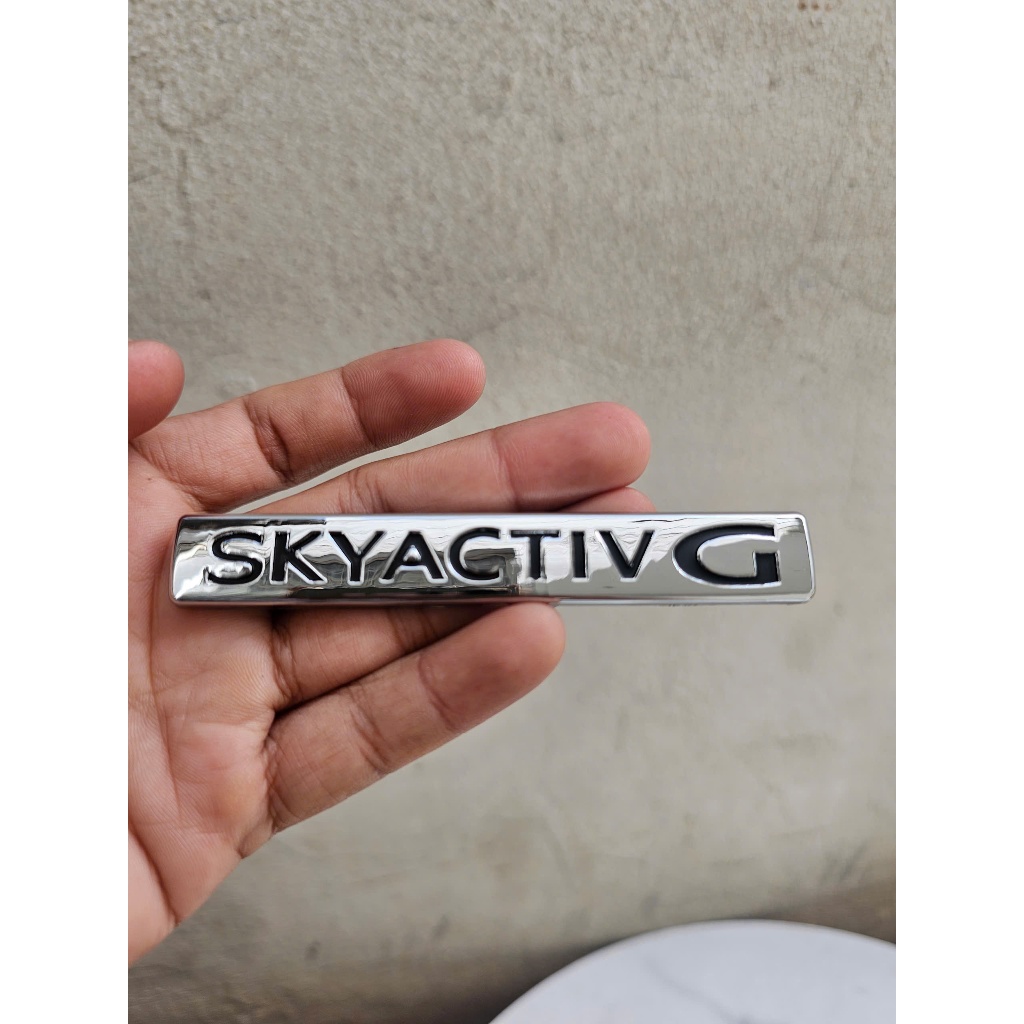 Skyactiv G embossed lettering is stuck on the back of Mazda CX-30, CX-5 ...