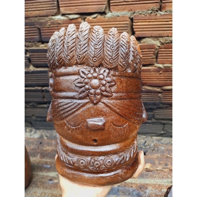 Aboriginal girl's terracotta pot used to grow succulents and cacti ...