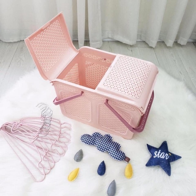 Plastic basket with rattan lid to store birthing items for mother and ...