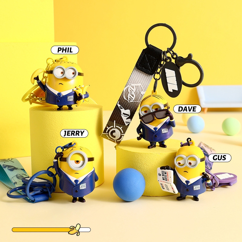 Minion Minions keychain with box - holding bananas, reading newspapers ...