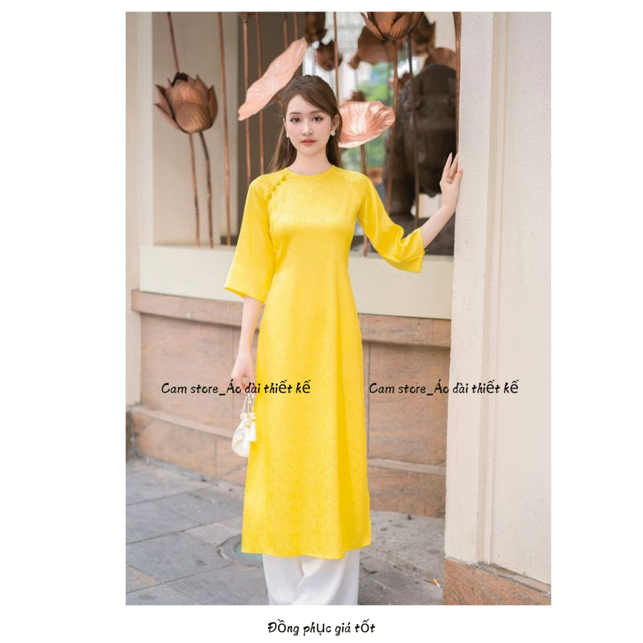 Renovated ao dai with beautiful yellow silk brocade and buttons, round neck with striking ...