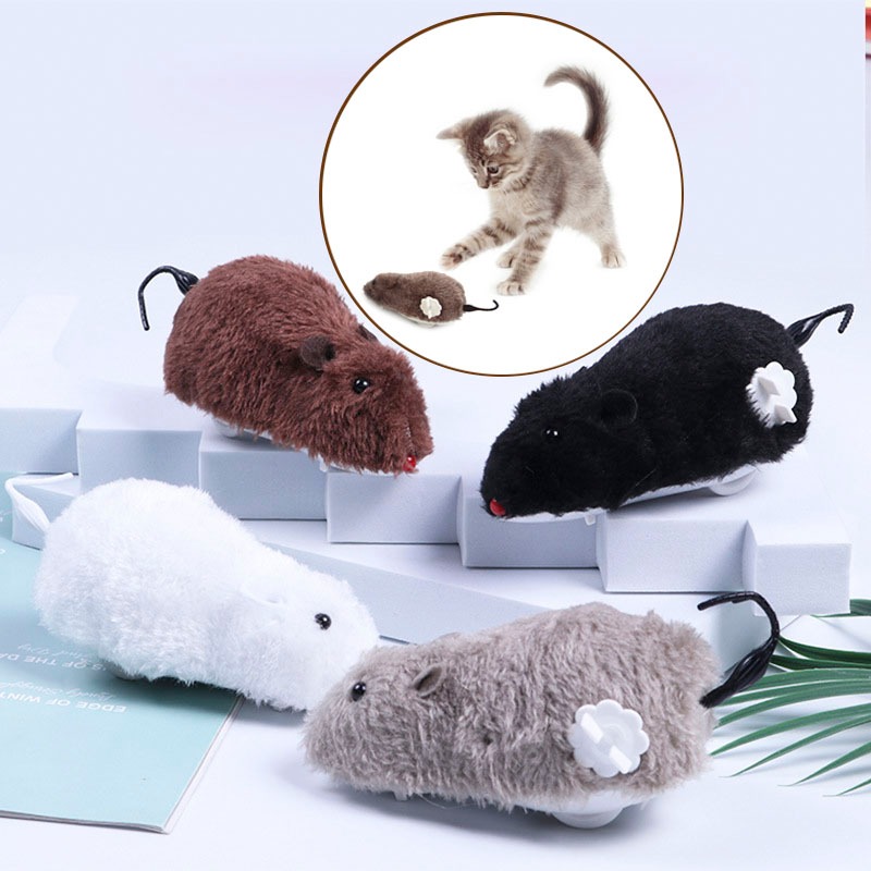 Realistic stuffed fake mouse toy powered by a wind-up, entertaining ...