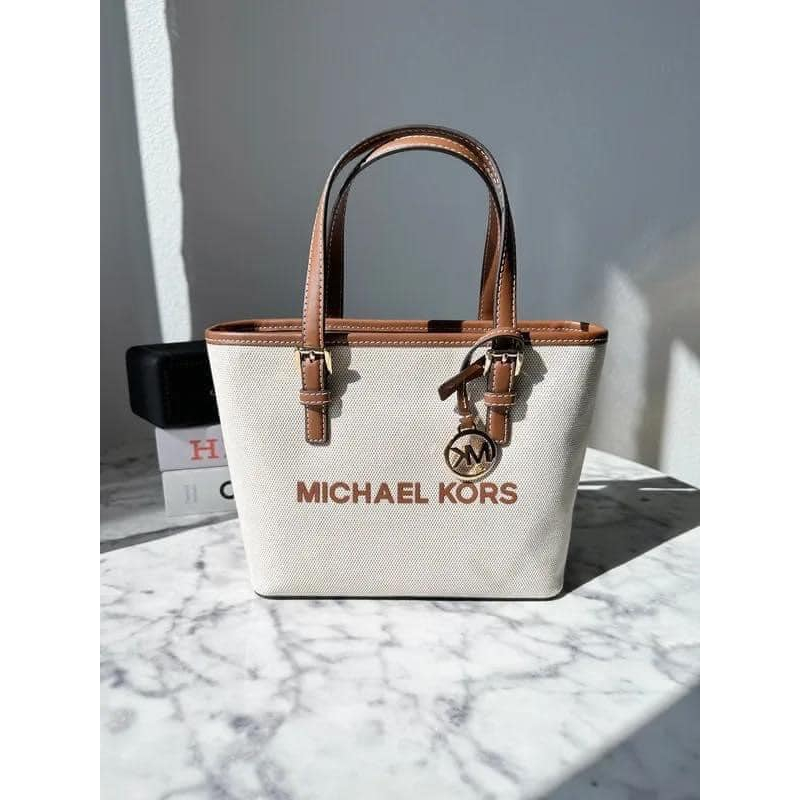 Michael Kors - MK Natural Jet Set Travel Extra-Small Canvas Top-Zip ...