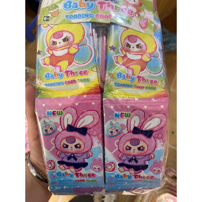 String of 36 packs of x8 cards, super vip emulsion coated baby three ...