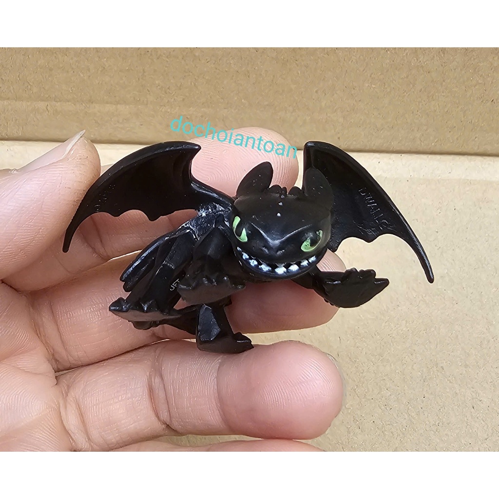 Black Mini Dragon model toy (Toothpick) from the movie "How to train ...