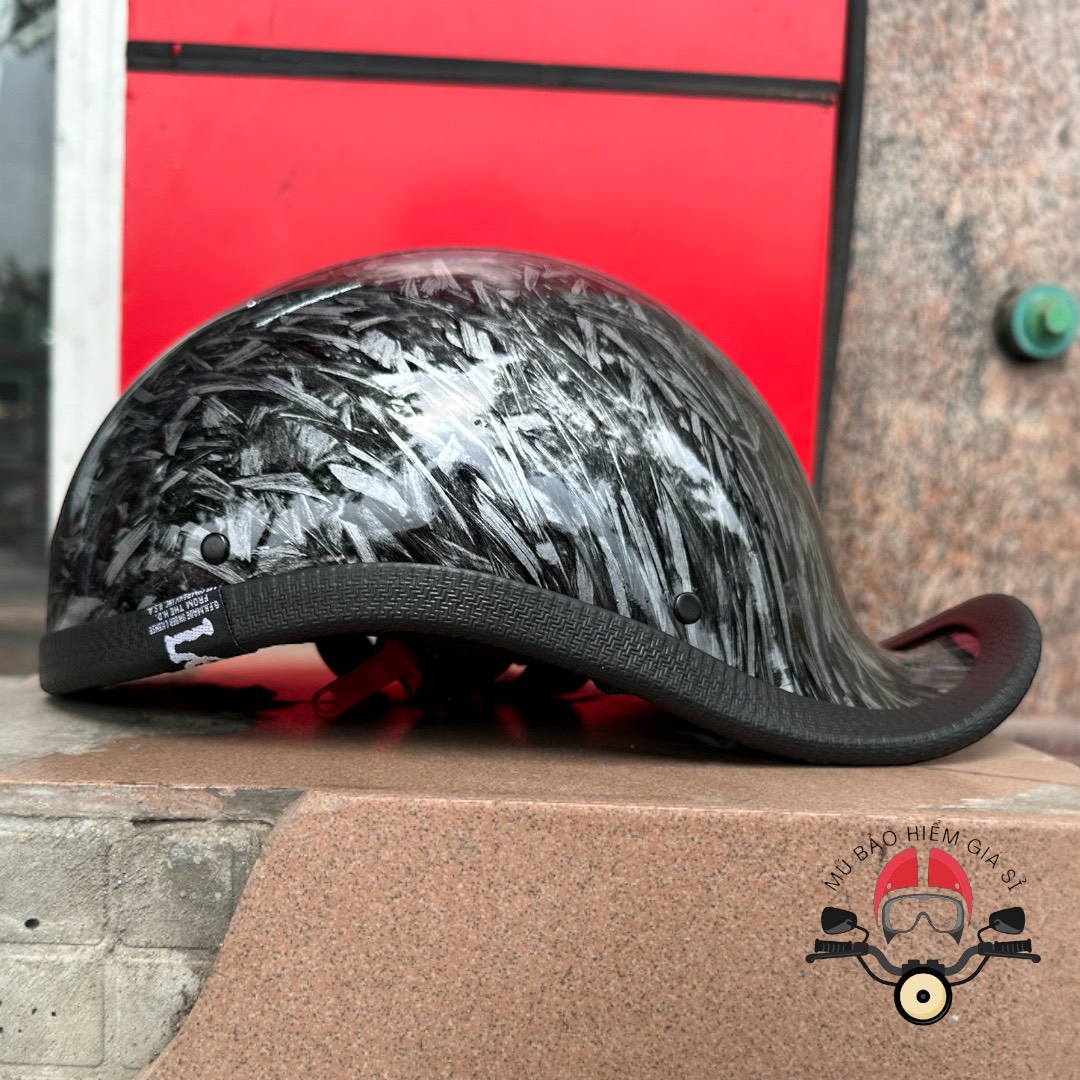 Gangster helmet worn backwards and down, Extremely light form, dusty ...