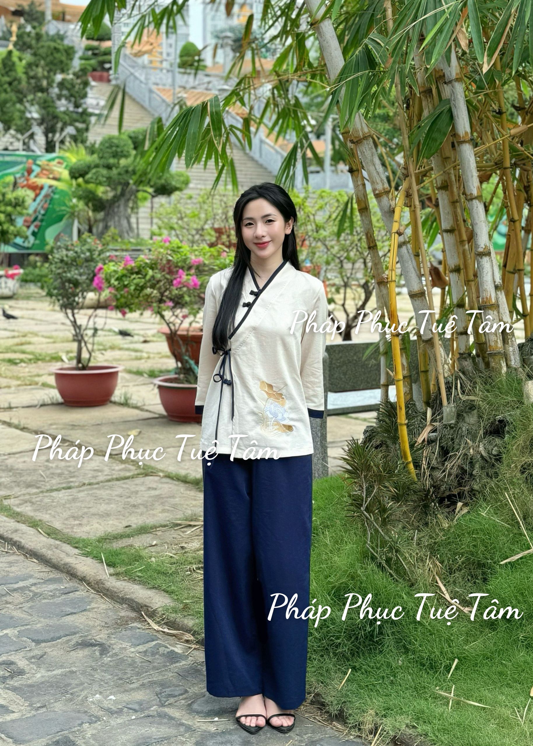 Women's temple outfit with diagonal tie embroidered with lotus flowers ...