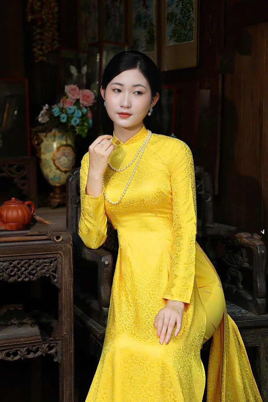 Traditional brocade silk ao dai with luxurious yellow high neck ...