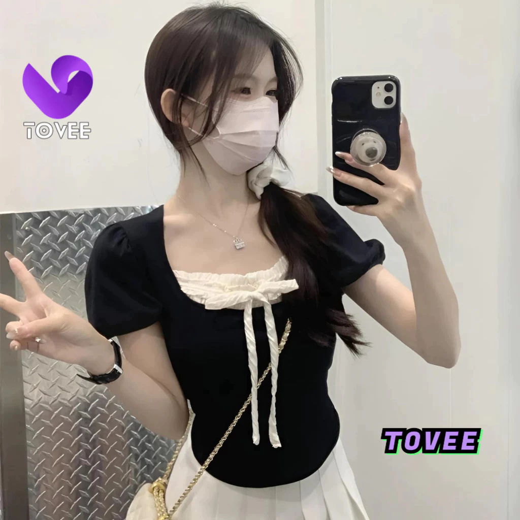 Women's body-hugging crop top with puffed collar and bow tie, round hem ...